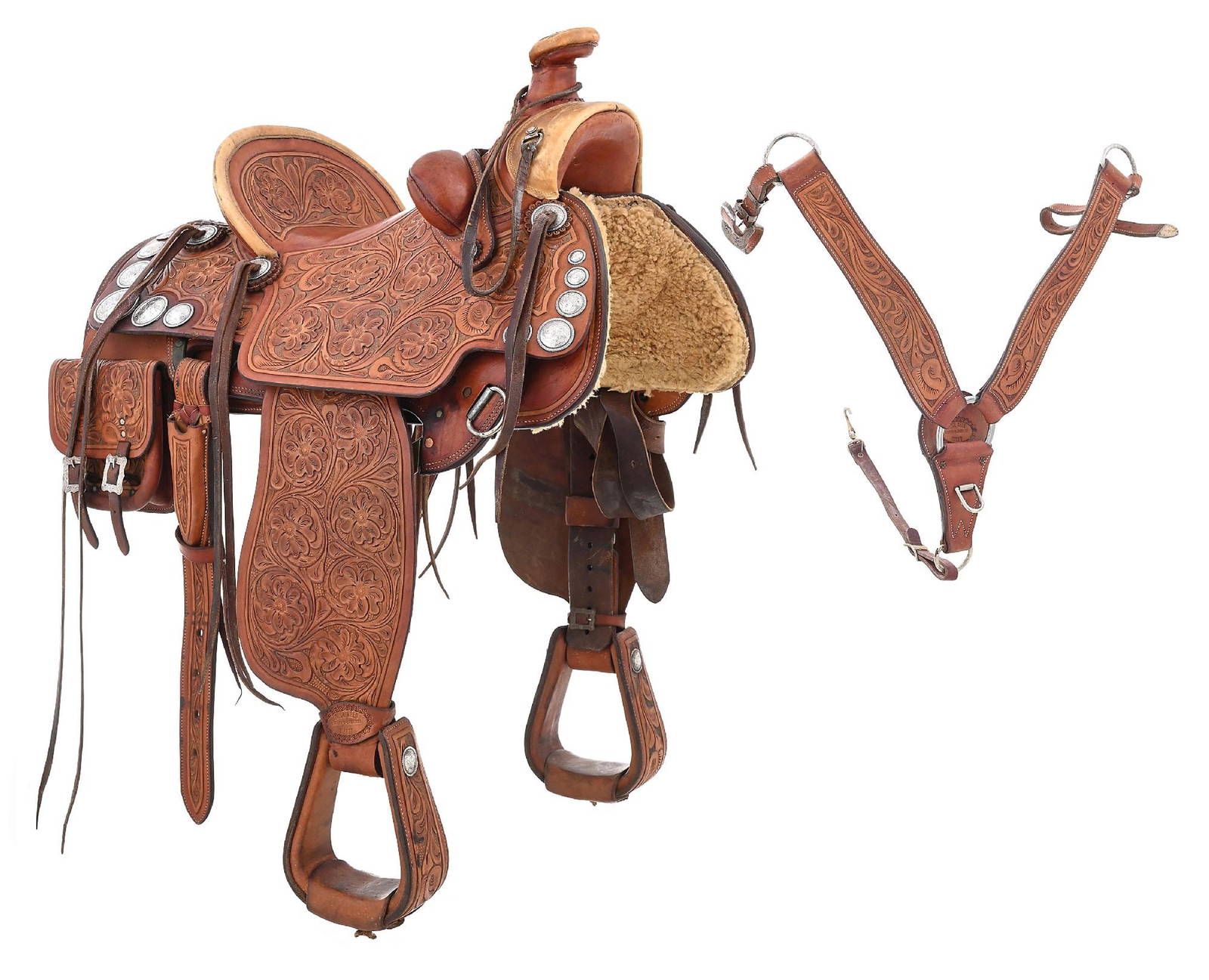 Chuck Reed's Personal Floral Tooled Saddle Auction