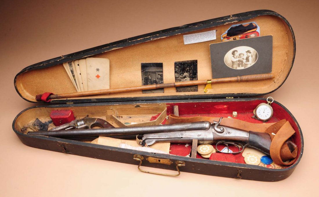 Violin Case with Guns and Gambling Items.