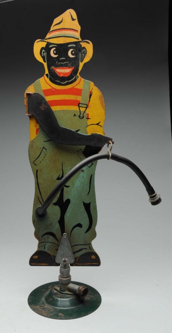 Tin Sambo Lawn Sprinkler.