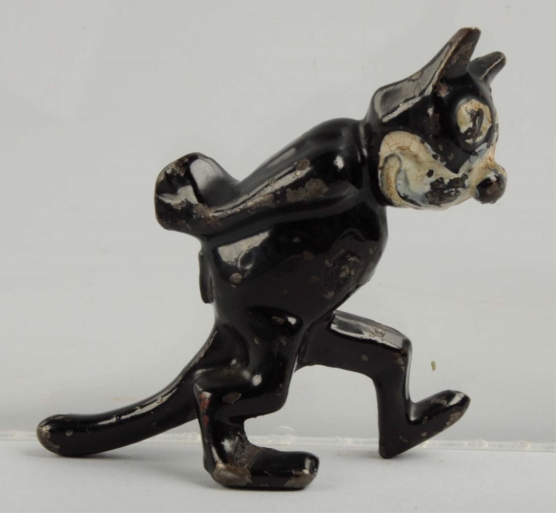 Cast Iron Felix the Cat Paperweight.