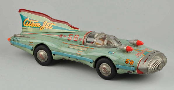 Japanese Tin Litho Friction Atom Jet Race Car.