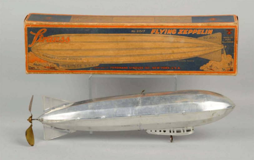 Strauss Tin Wind Up Flying Zeppelin Toy.