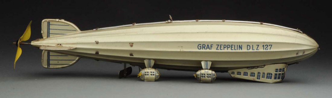 German Tin Litho Wind-Up Tippco Graf Zeppelin Toy.