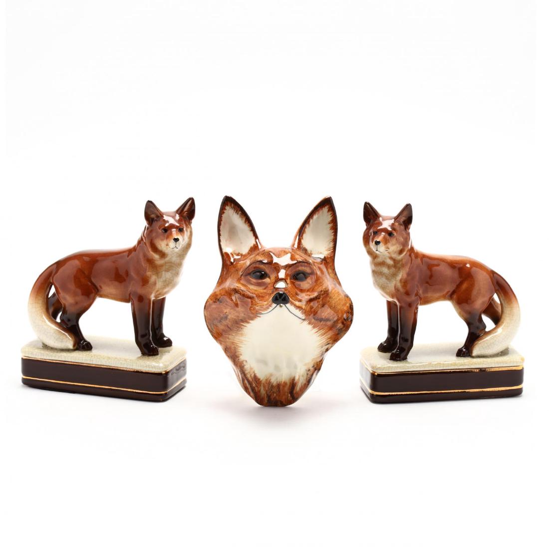 Three Porcelain Fox Figures