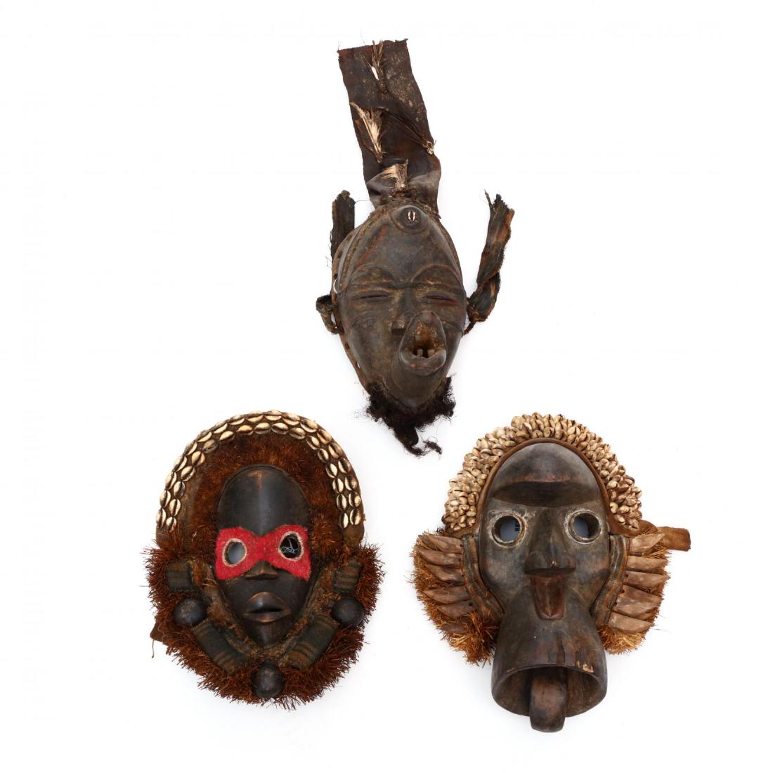 Three Carved and Decorated Dan Masks