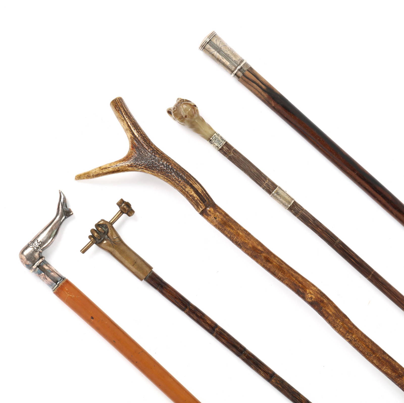 A Collection Of Five Vintage Canes Auction