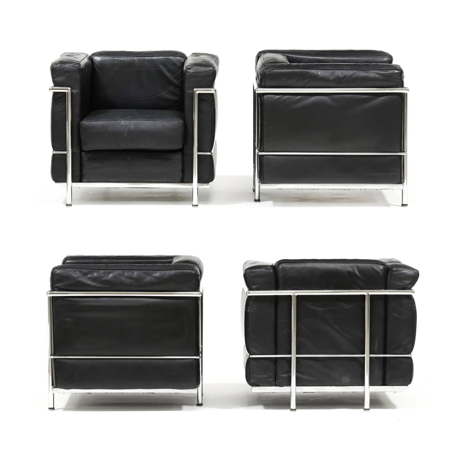 After Le Corbusier, Set Of Four Lc2 Chairs Auction