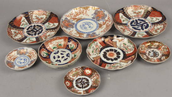 A Collection Of Seven Japanese Imari Porcelain Plates And A Barbers Bowl