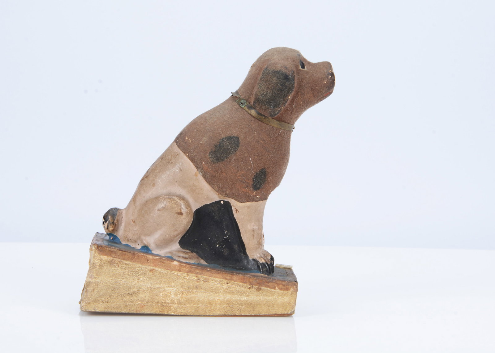 An 19th Century German Papier-mâché Dog Squeak Toy, Auction