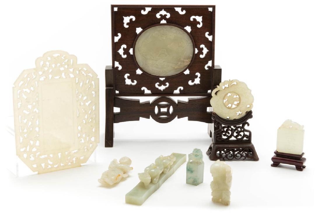 A group of eight carved jade objects