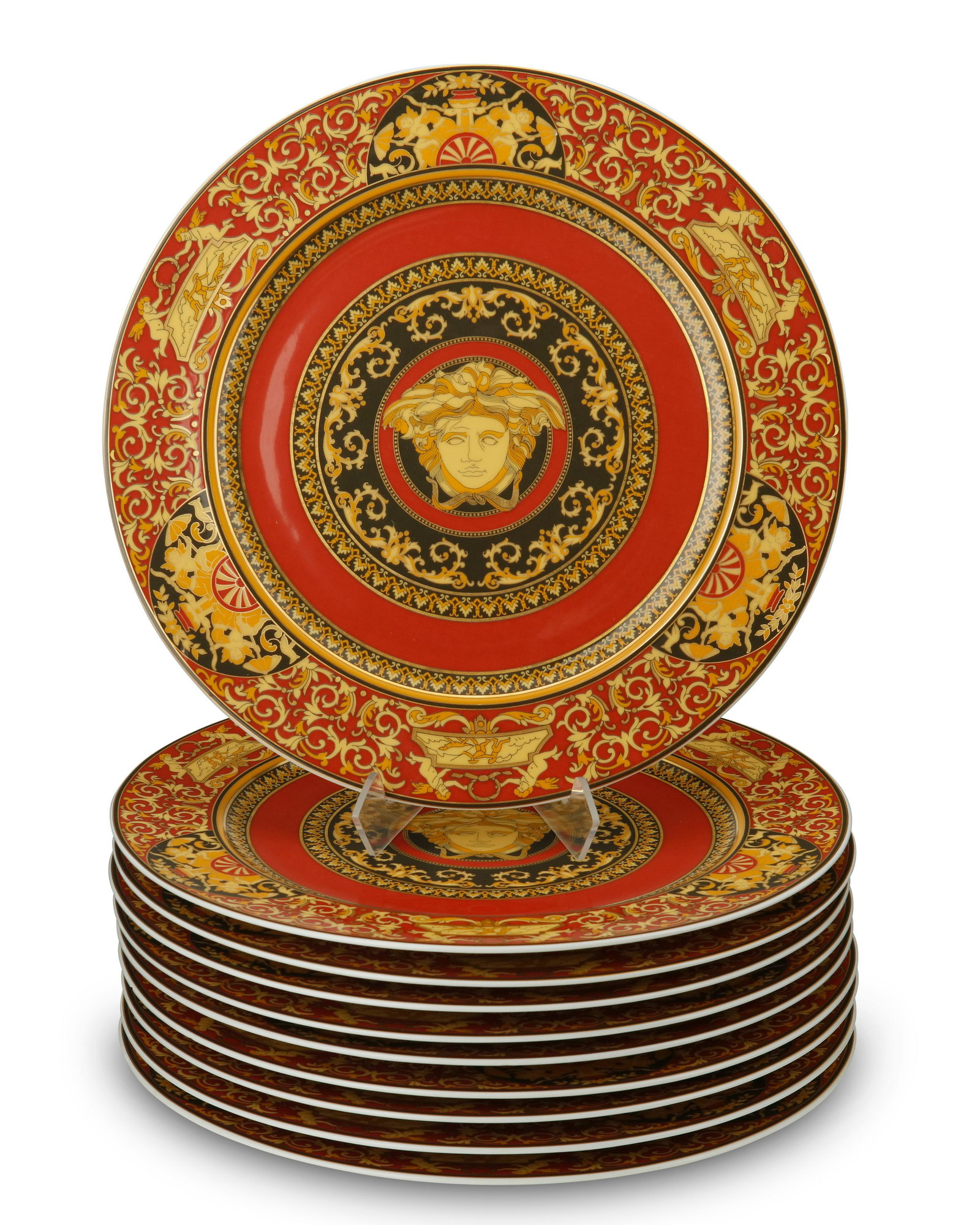 A Group Of Versace "medusa" Charger Plates