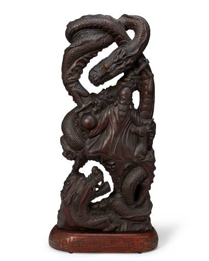 A Large East Asian Carved Wood Statue