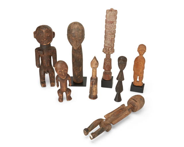 A Group Of African Carved Wood Figures