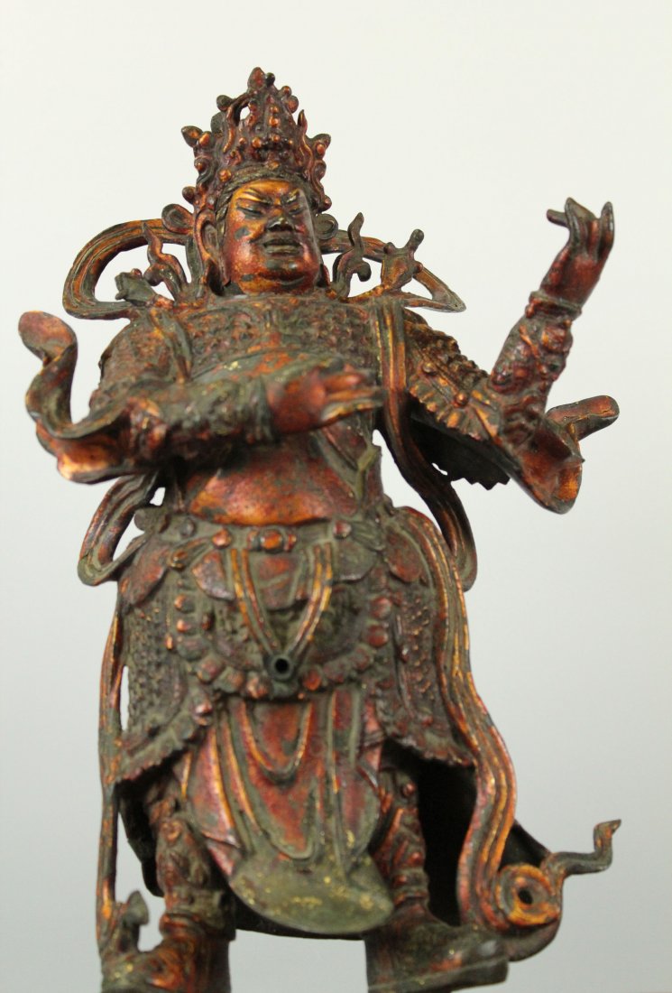 A Rare Chinese Gilt Lacquer Bronze Statue of Lokapala.