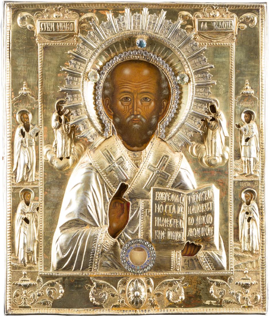 A RARE ICON SHOWING ST. NICHOLAS OF MYRA WITH A