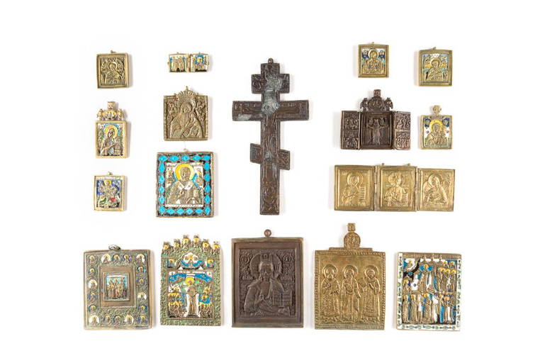 A Collection Of Seventeen Brass Icons Showing Different