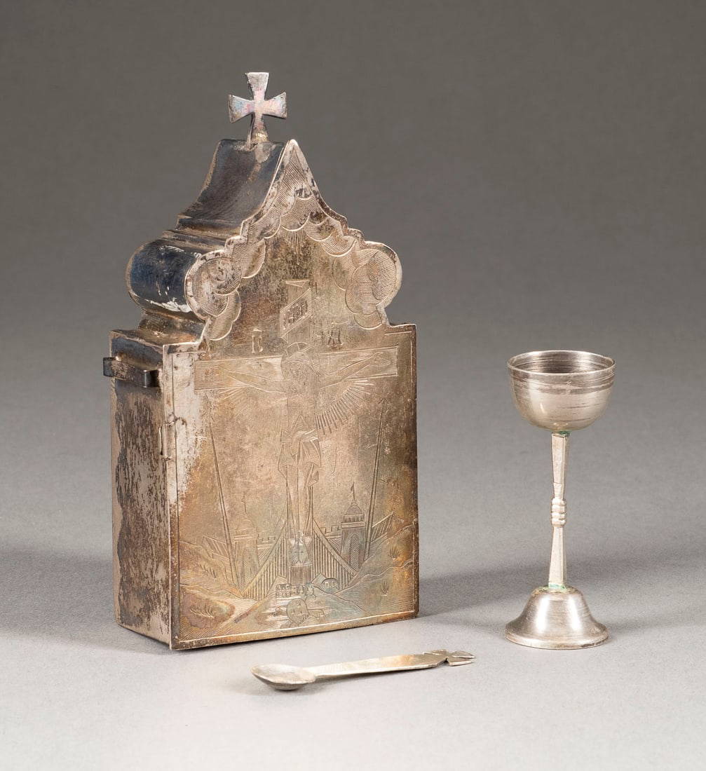 A Silver Travelling Communion Set Showing The Crucifixion Auction