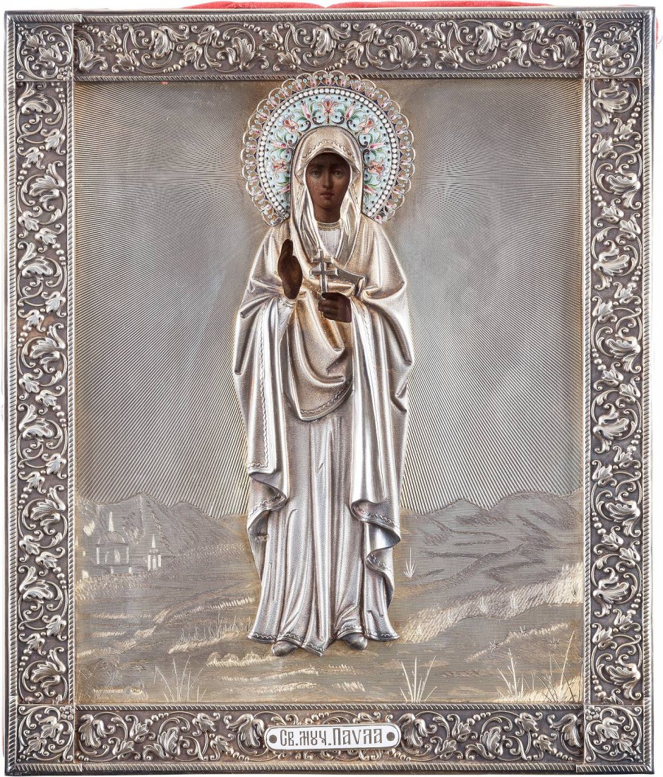 AN ICON SHOWING THE MARTYR SAINT PAULA WITH SILVER-GILT