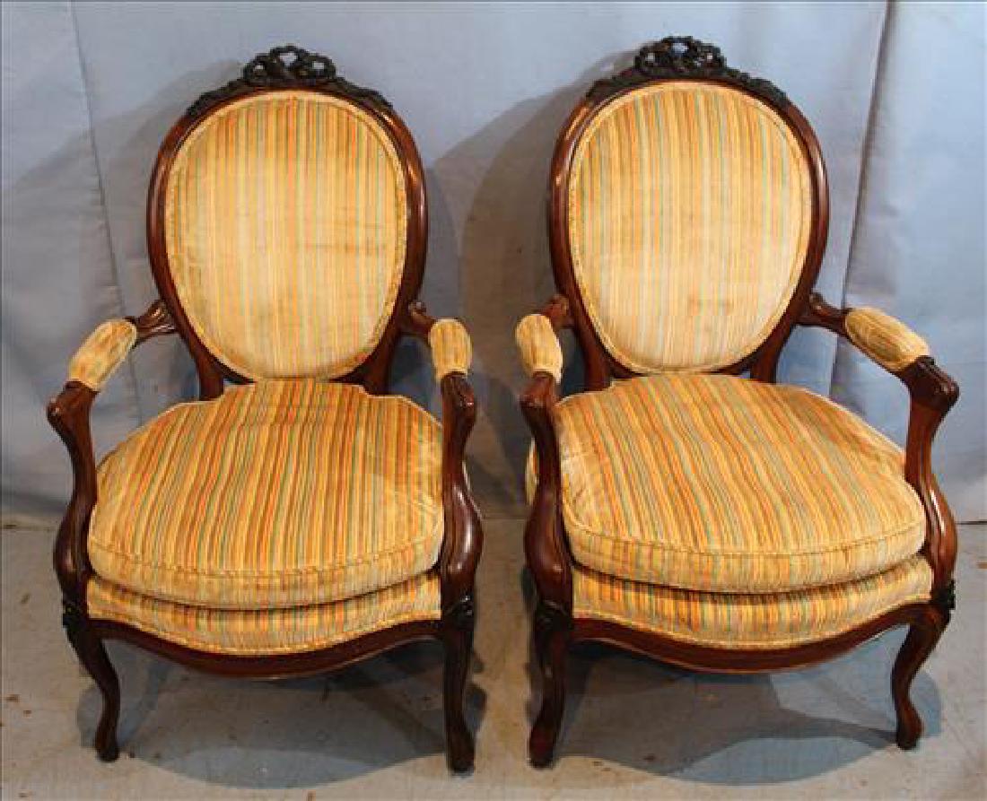 Pair rosewood Victorian arm parlor chairs with carving
