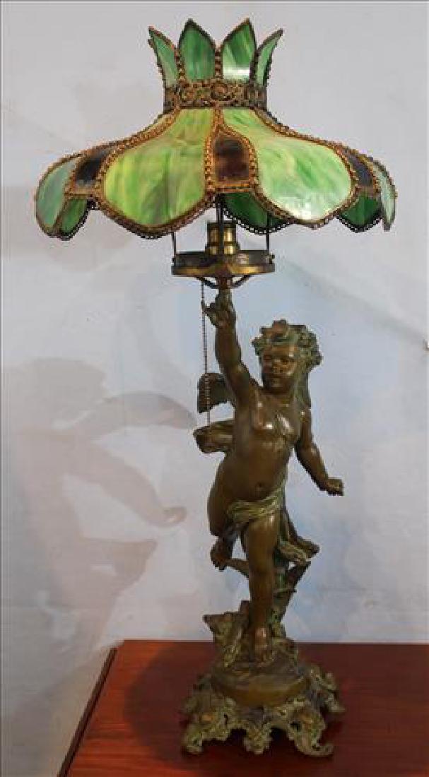 Bronze cupid lamp with green slag glass shade, 33 in.