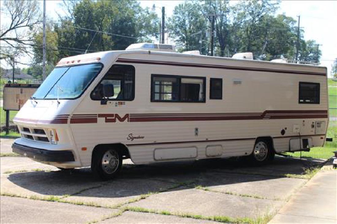 1987 motor home, 12,000 miles Travelmaster, signature