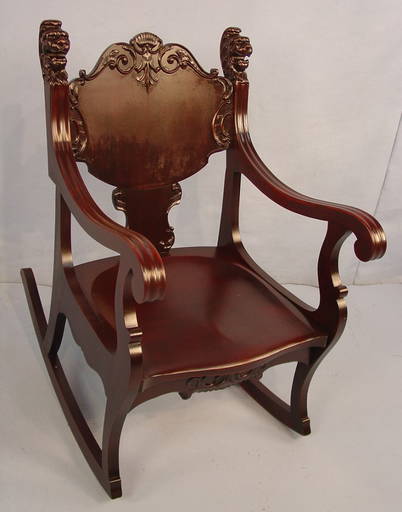 Solid Mahogany Curved Rocker With Lions Head On Both Si