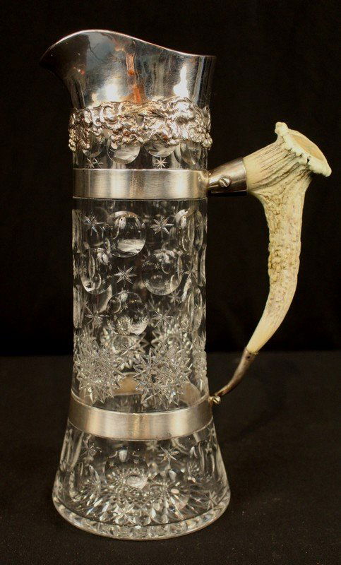 Cut glass pitcher with bone handle, silver-plate trim