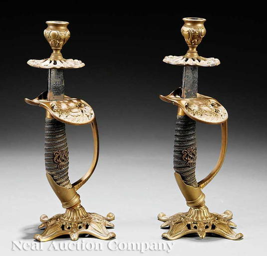 Brass Candlesticks Fashioned From Sword Hilts