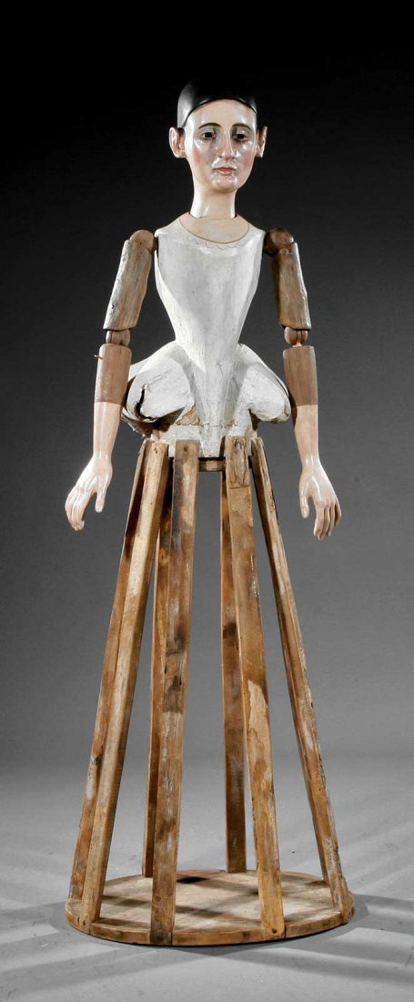 An Carved and Painted Santos Cage Doll