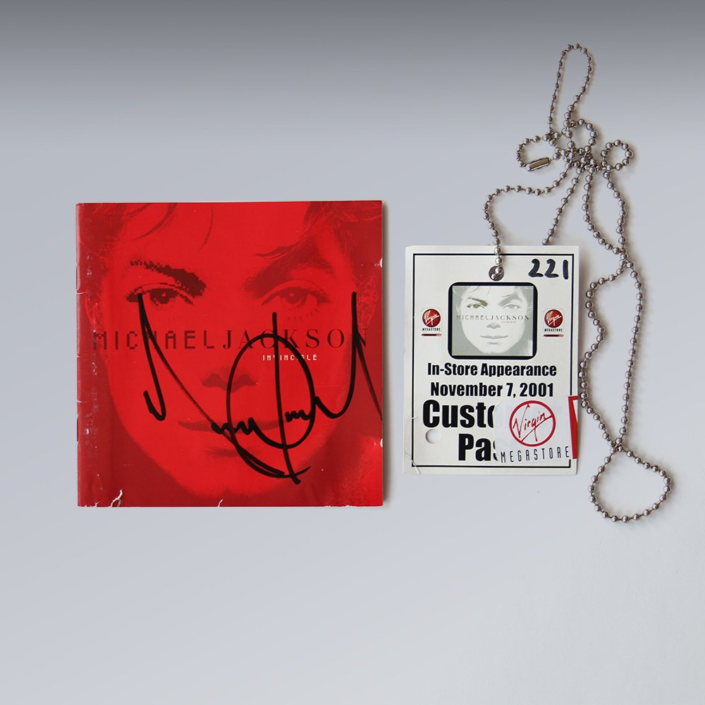 Michael Jackson signed red Invincible CD