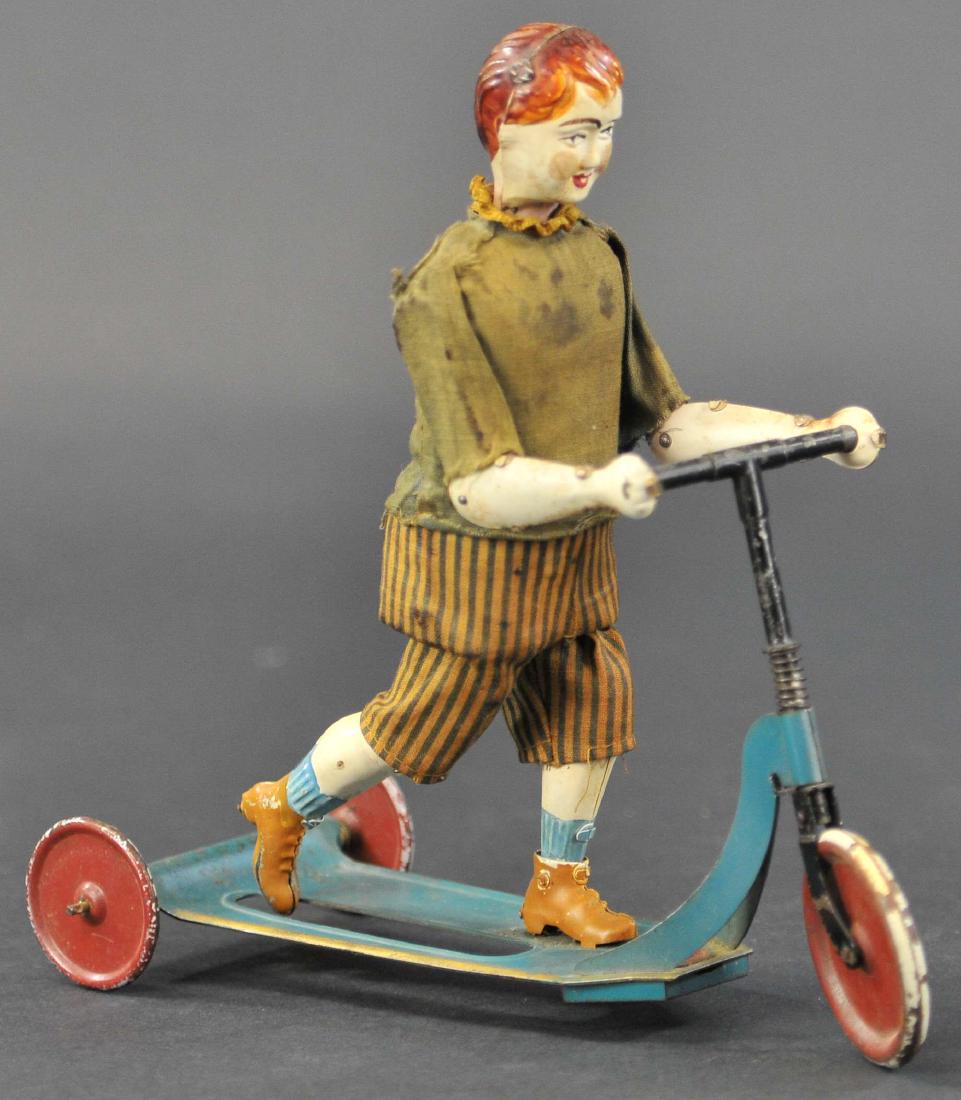 VICTOR BONNET BOY ON SCOOTER