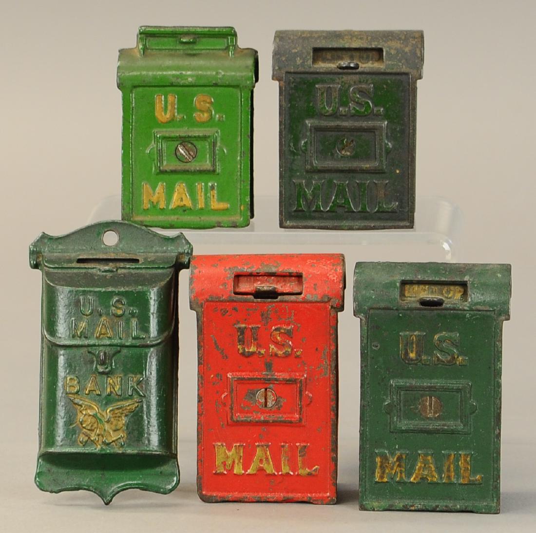 FIVE CAST IRON MAIL BOX BANKS