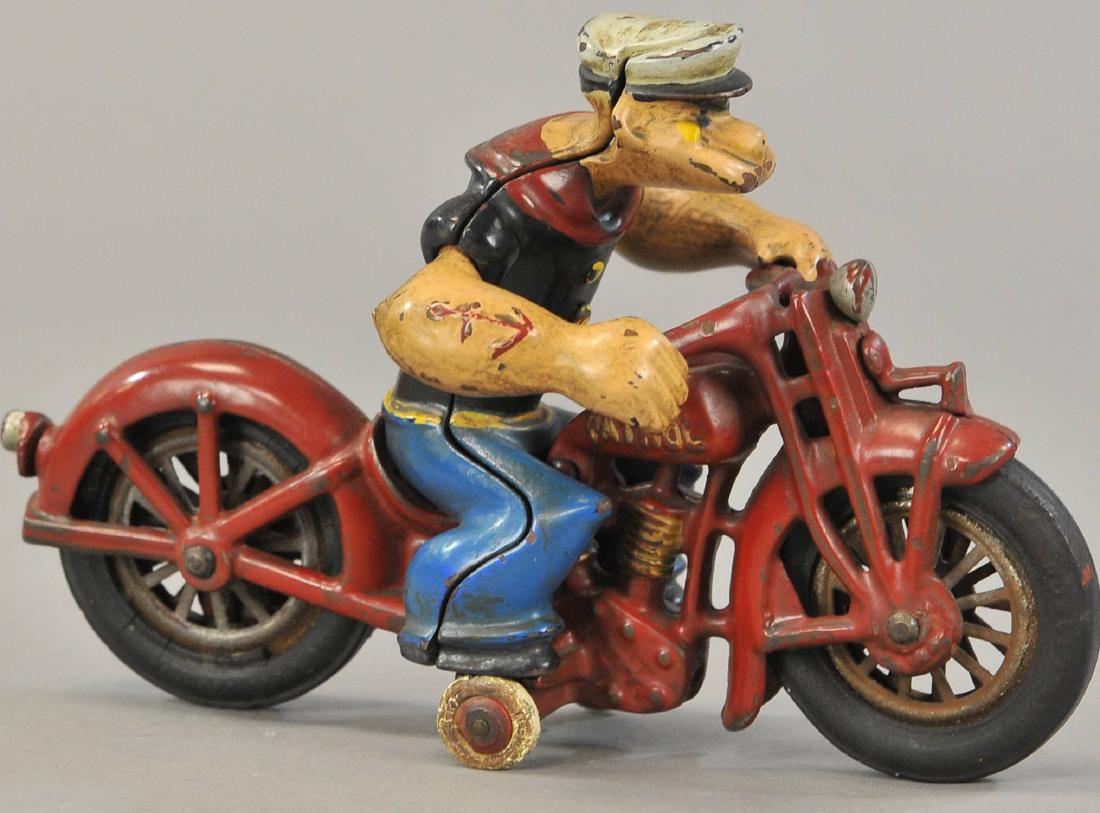 POPEYE RIDING MOTORCYCLE