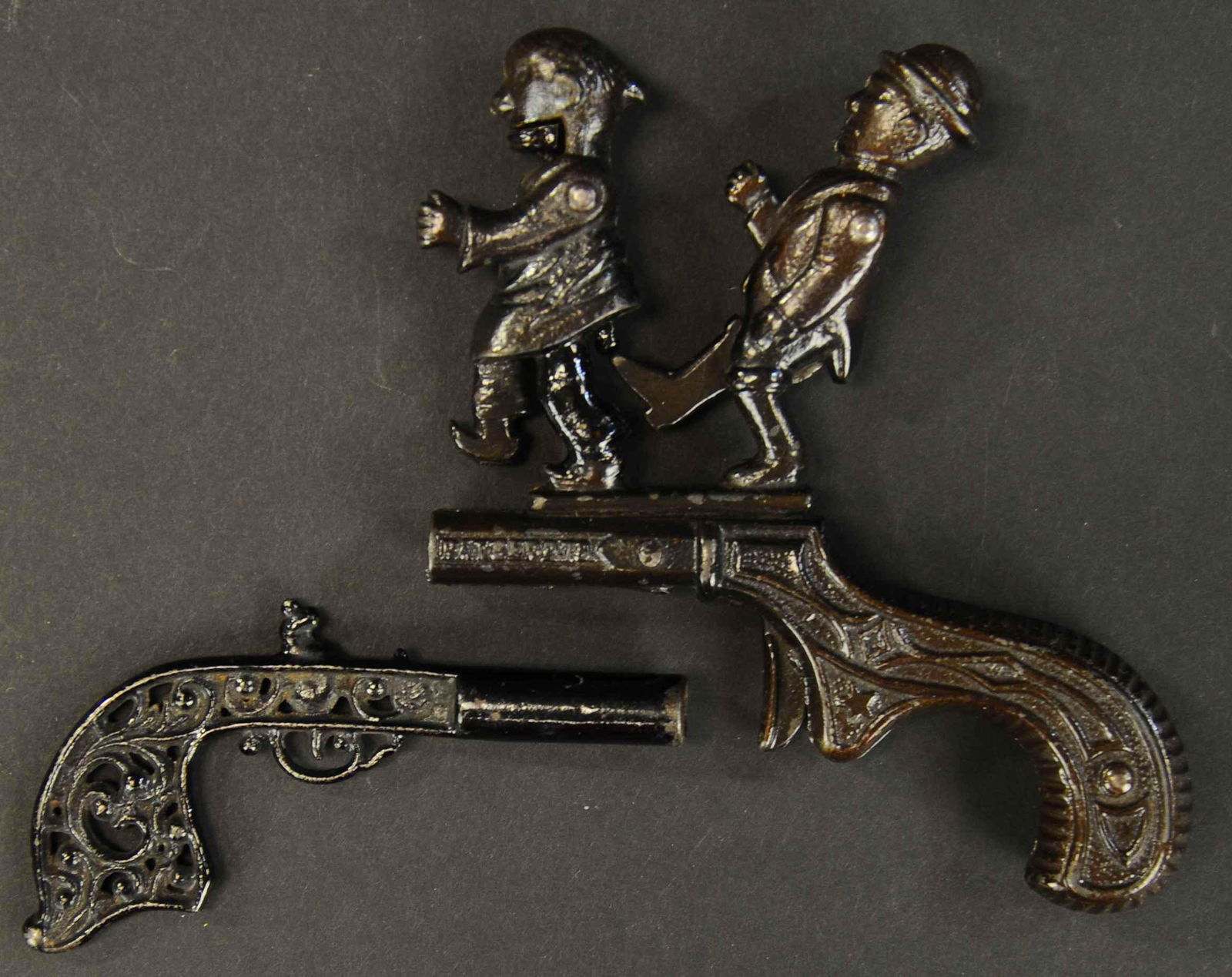 LOT OF TWO CAST IRON CAP GUNS - Oct 11, 2019 | Bertoia Auctions in NJ