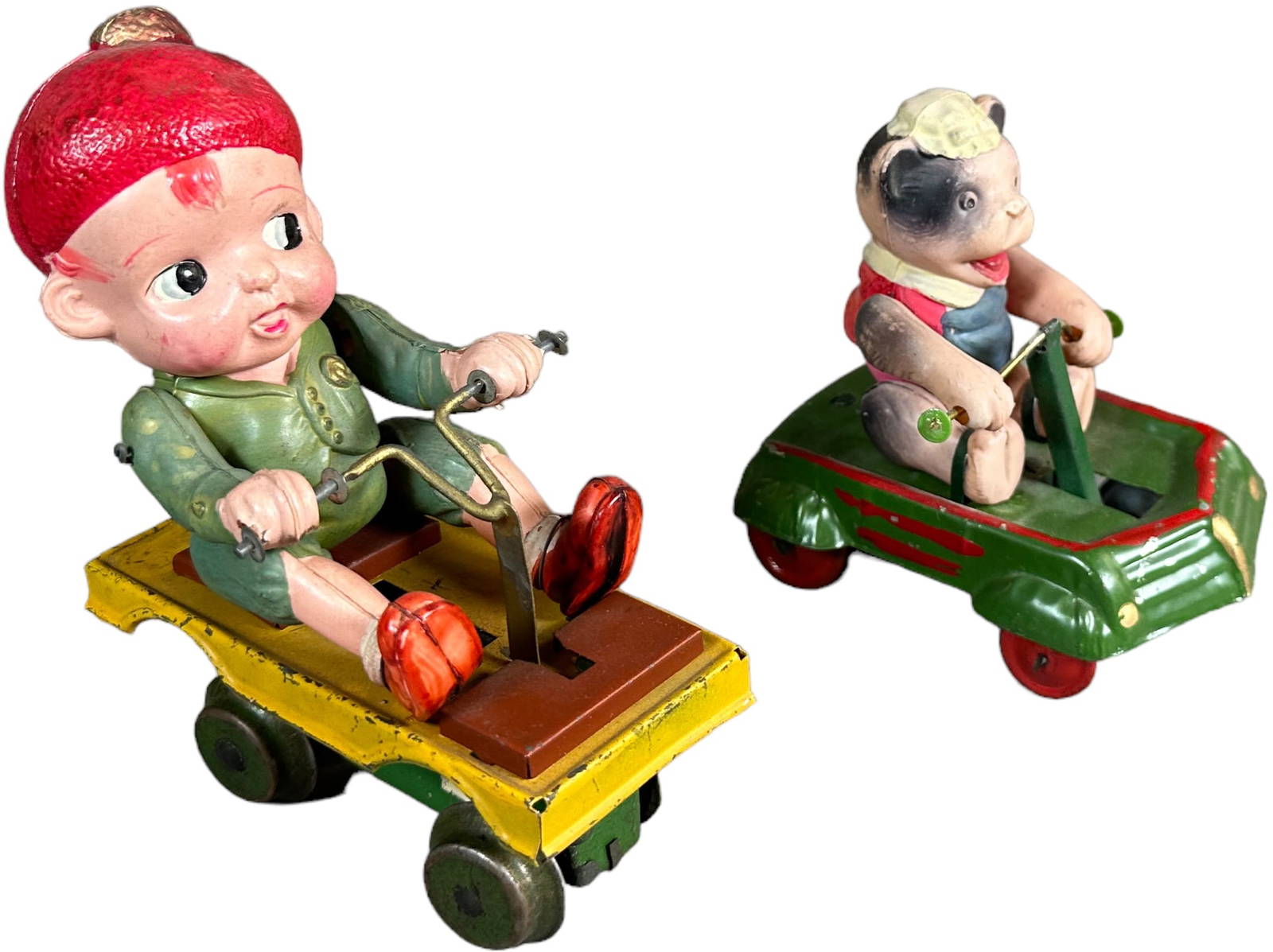 Two Celluloid Wind-up Coaster Carts Auction