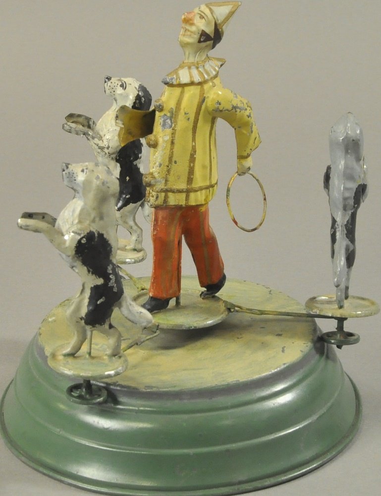 CLOWN WITH PERFORMING POODLES