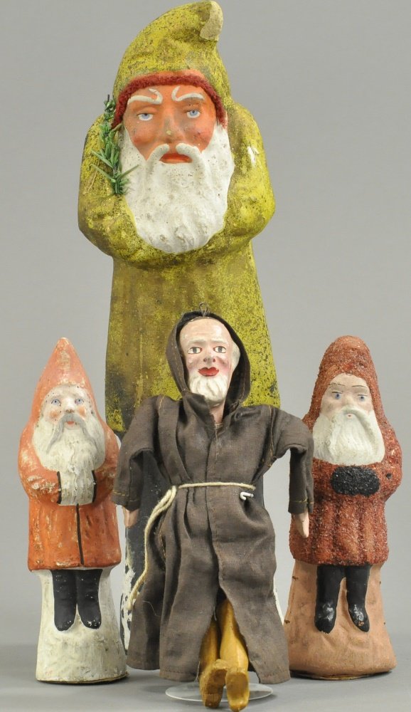 FOUR EARLY GERMAN SANTAS