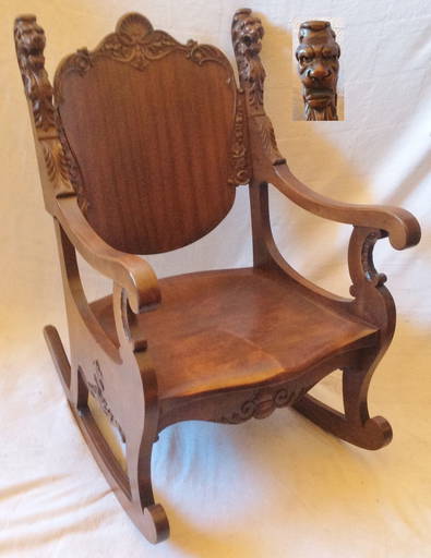 Carved Mahogany Lion Head Rocker