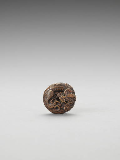 Fusho: A Boxwood Manju Netsuke Of A Coiled Dragon