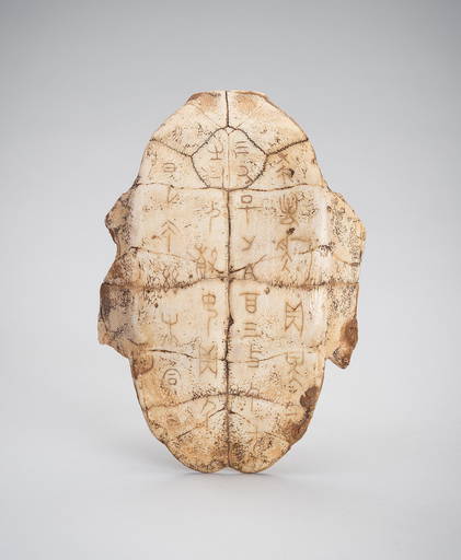 AN INSCRIBED SHANG DYNASTY 'ORACLE BONE' TURTLE PLASTRON, JIAGUWEN ...