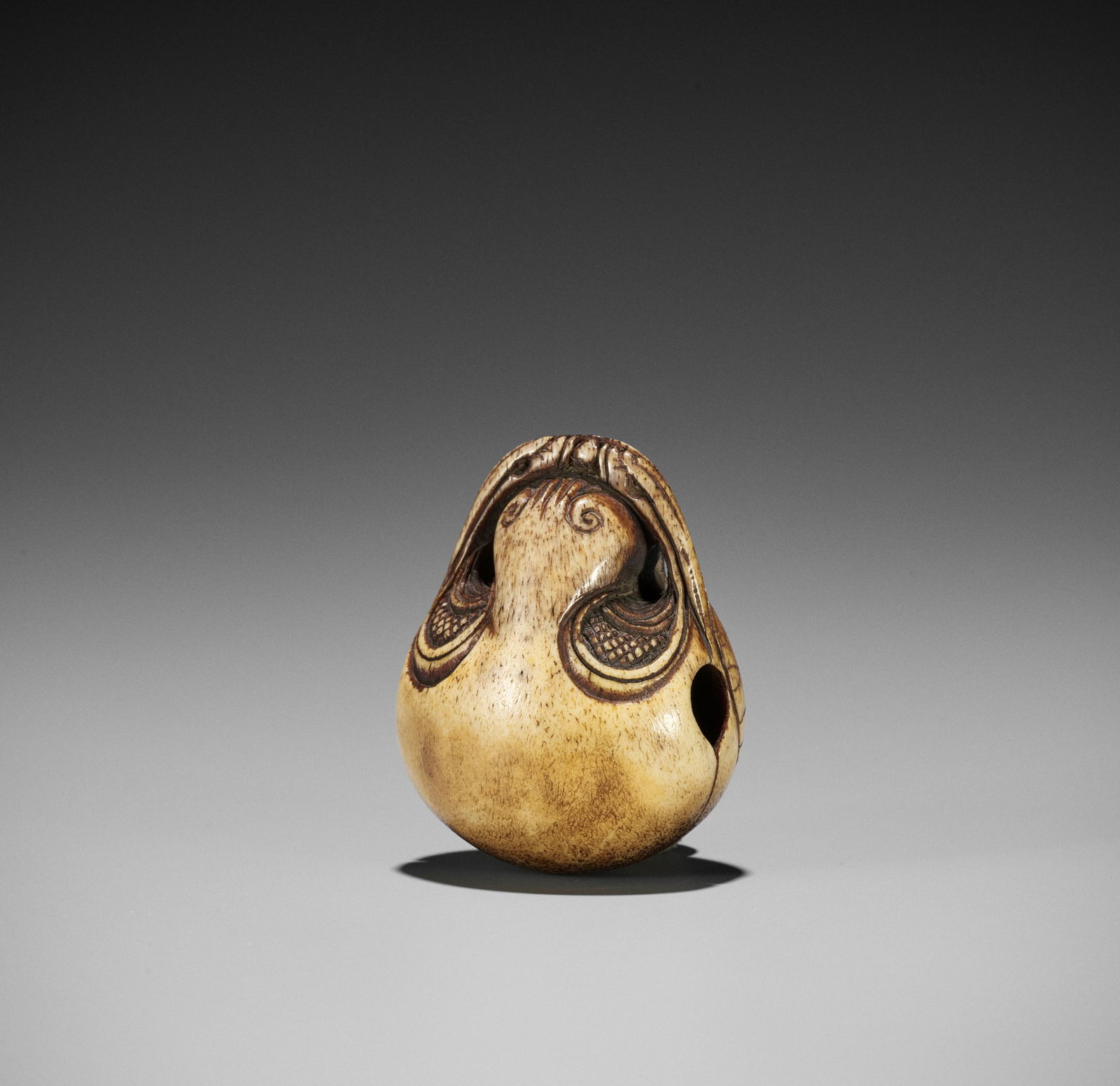 A RARE STAG ANTLER NETSUKE OF A DRAGON AND LOTUS MOKUGYO (#1538) on Jan ...