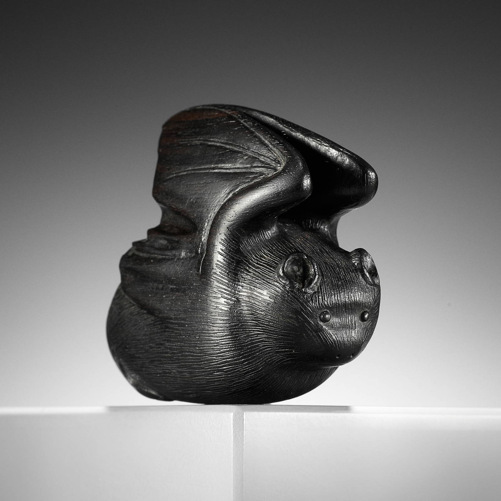 A Rare Ebony Wood Netsuke Of A Bat Auction