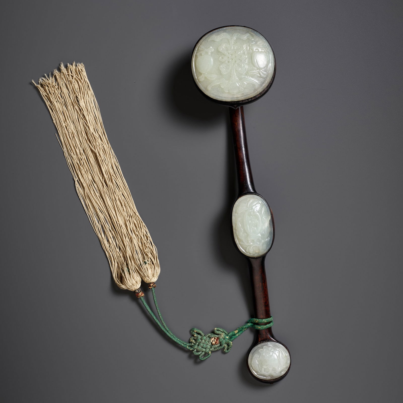 A Pale Celadon Jade-mounted Wood Ruyi Scepter, Qing Dynasty Auction