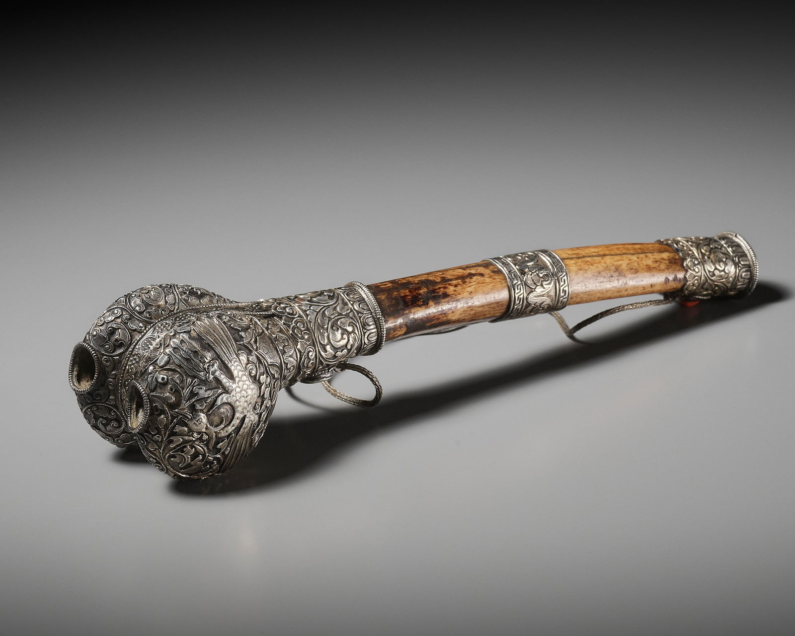 A Turquoise-inlaid Silver-mounted Bone Flute, Kangling, Tibet, 19th ...