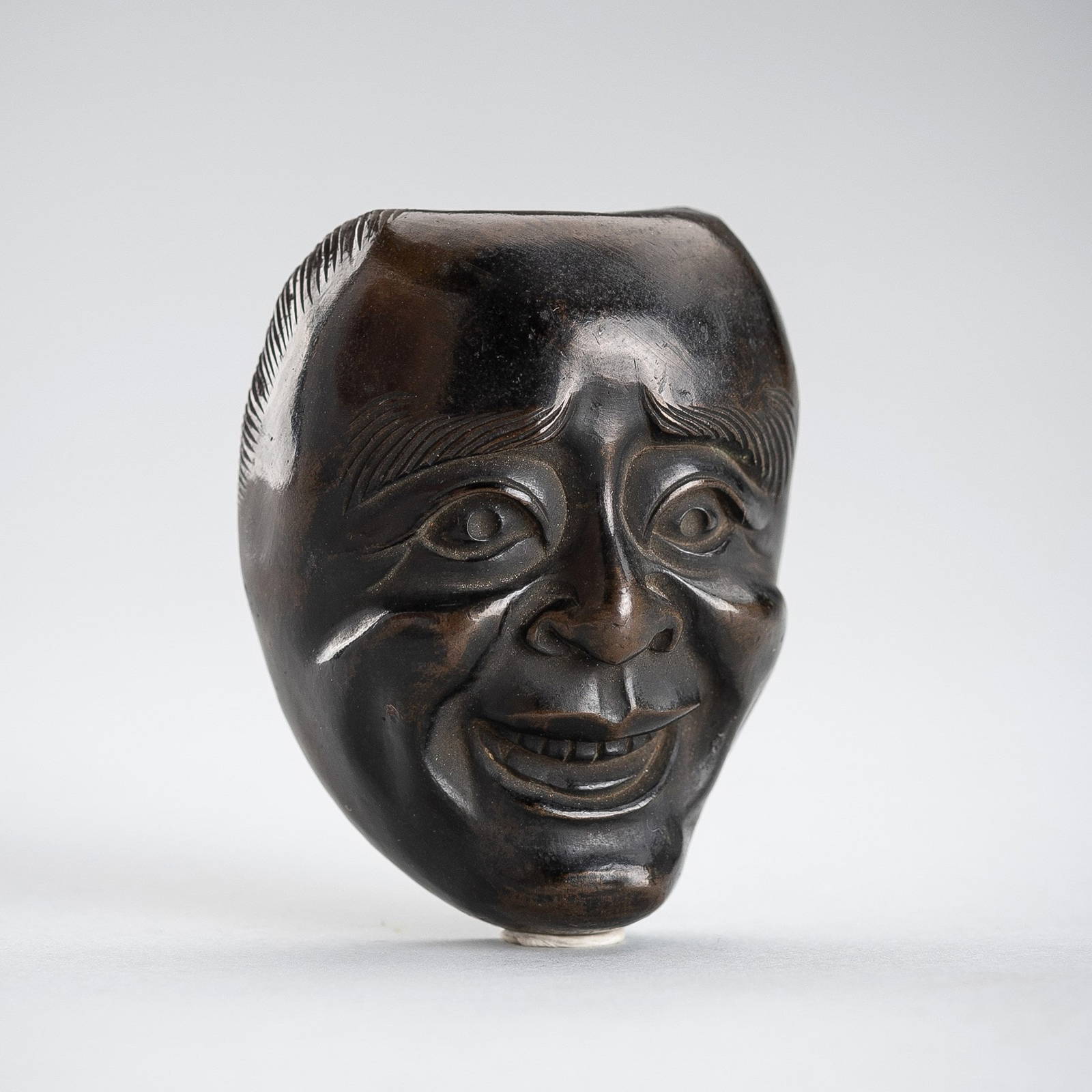 A Bronze Mask Netsuke Of A Man, Edo Period Auction