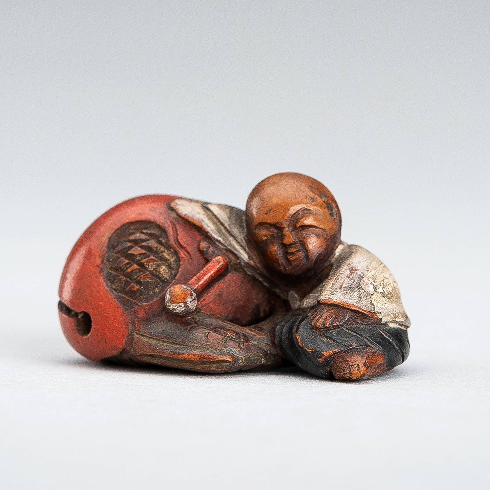 A Lacquered Wood Netsuke Of A Monk With Bell, Edo Period Auction