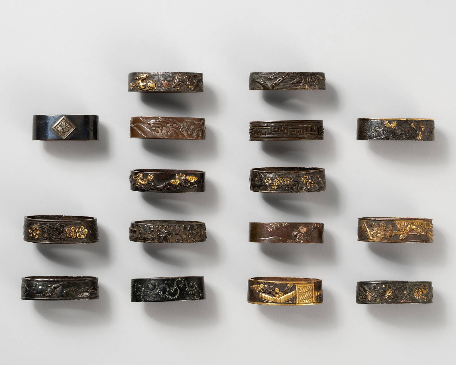 A Group Of Sixteen Mixed-metal Fuchi Auction