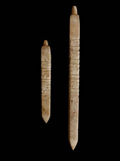 Pair Of Small Awl Shaped Objects