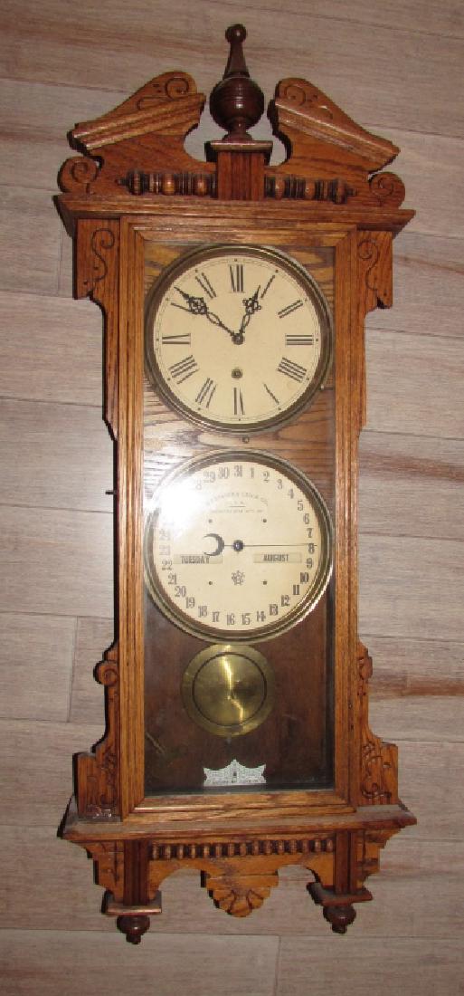 Antique Oak Waterbury Calendar Clock