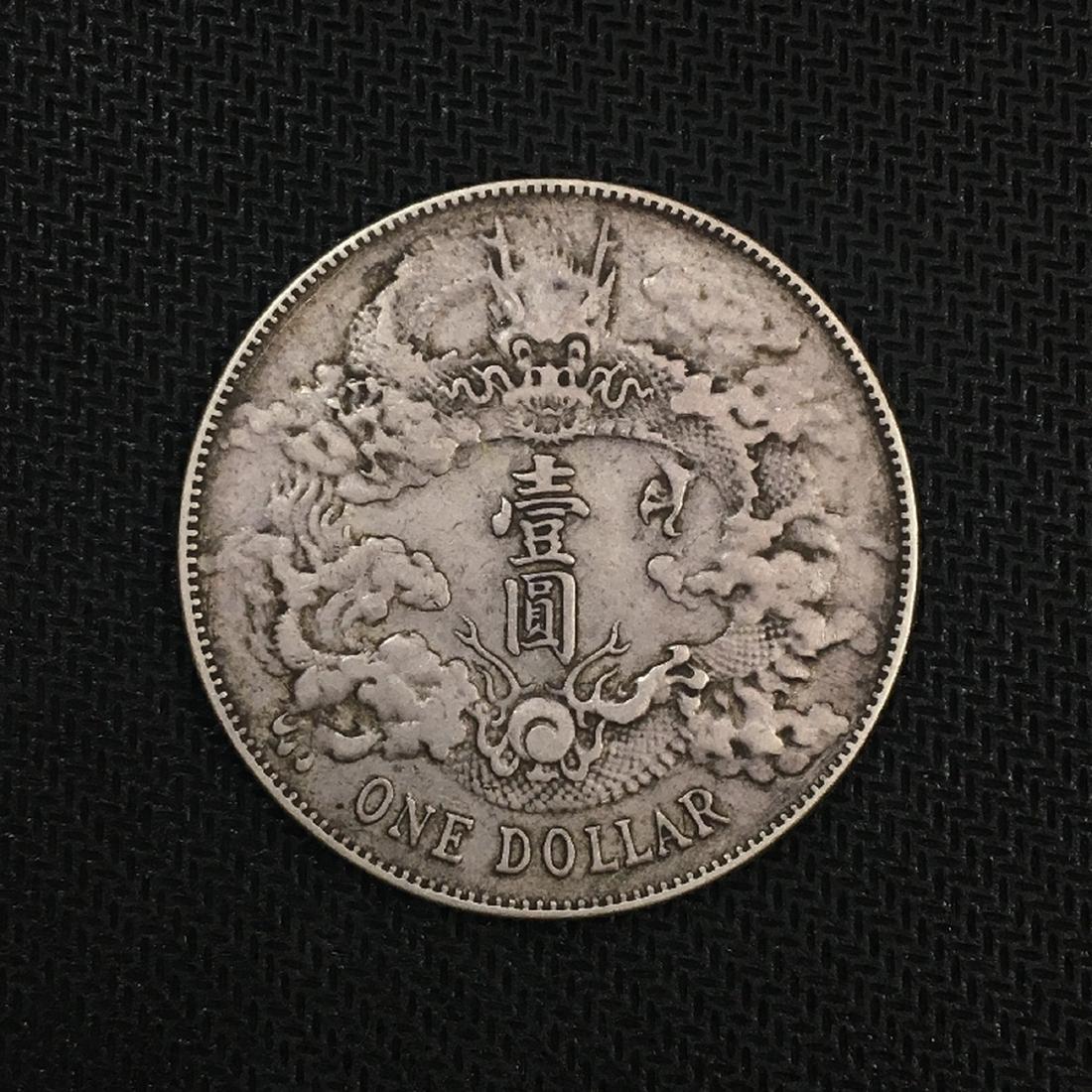 A CHINESE ANCIENT ONE DOLLAR SILVER COIN